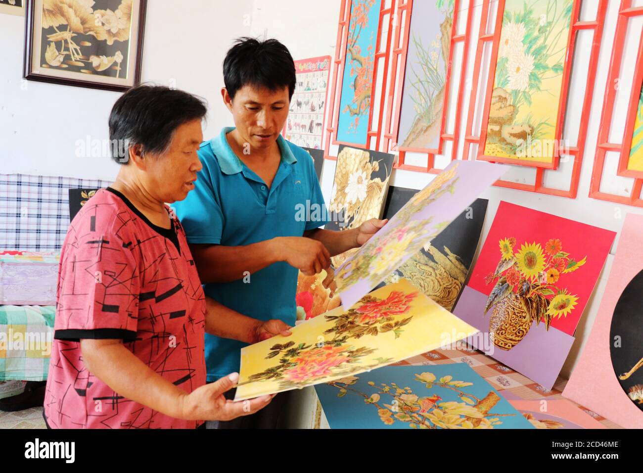 Artist and farmer Guo Shunling shows his art at Junying village ...