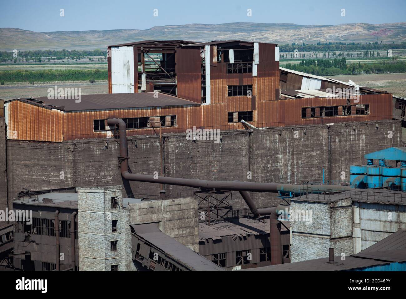 Old soviet unused outdated rusted factory building of metallurgy steel ...