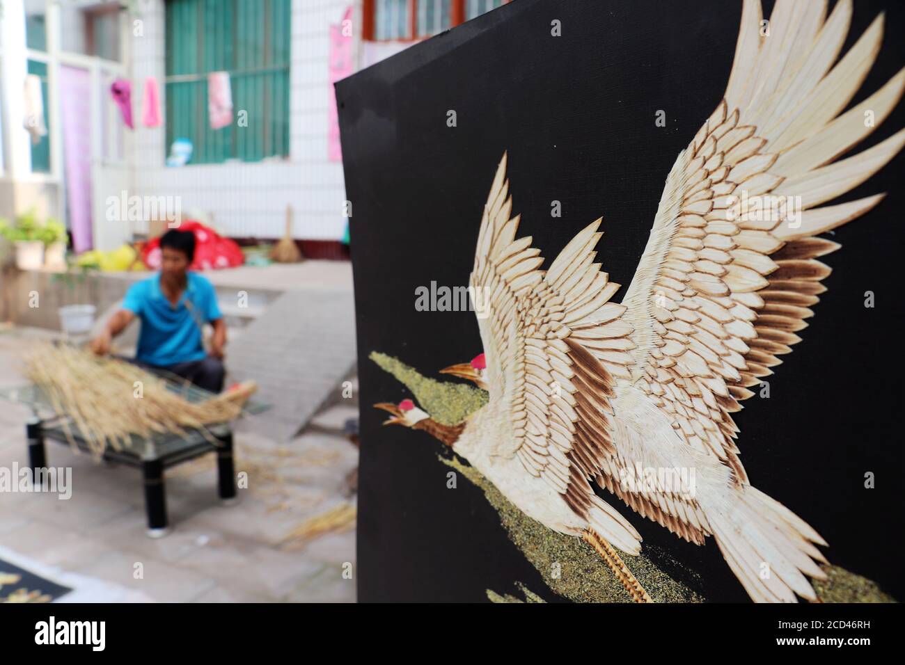 Artist and farmer Guo Shunling shows his art at Junying village ...
