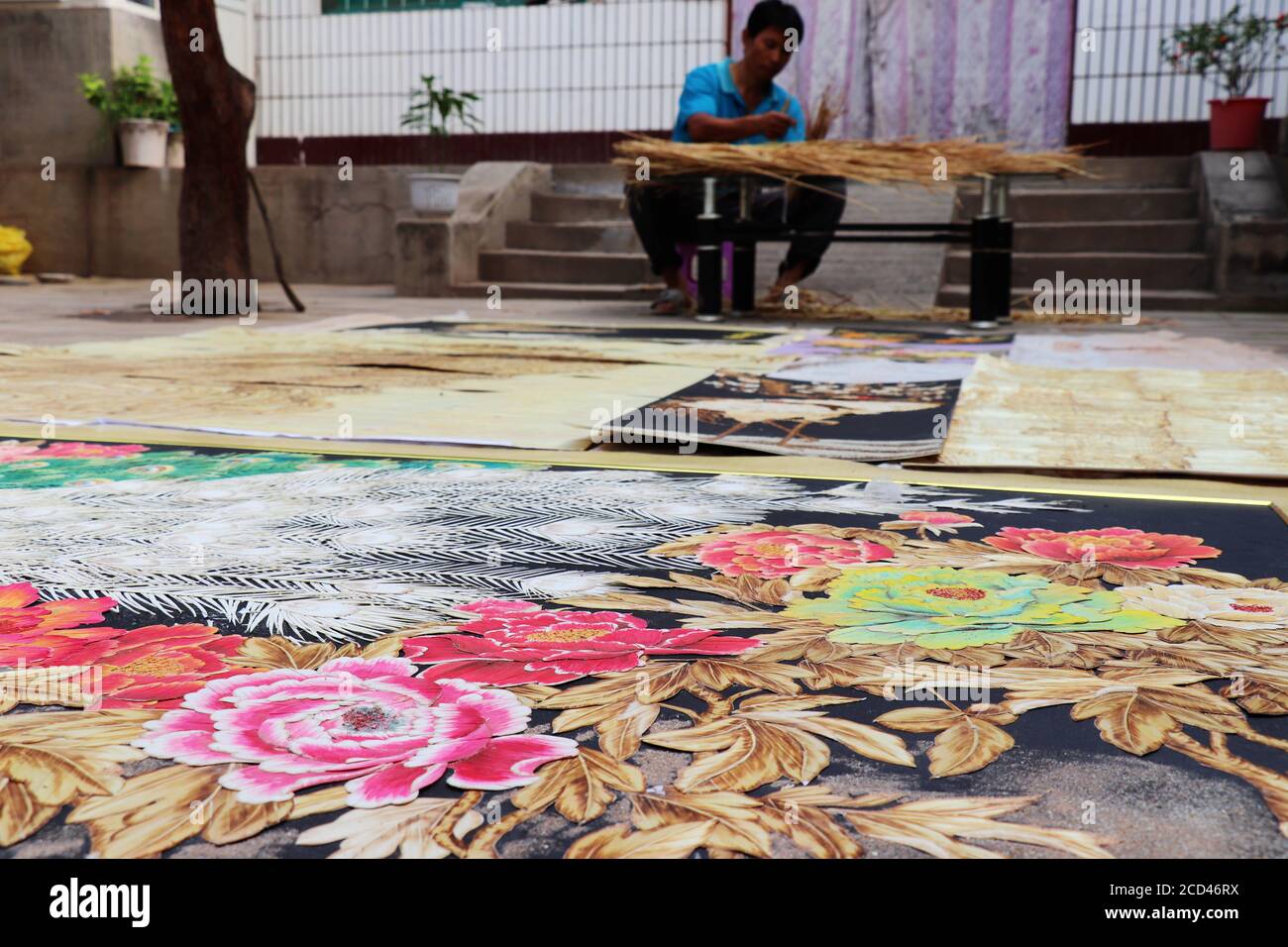 Artist and farmer Guo Shunling shows his art at Junying village ...