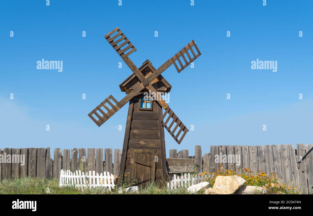 the small wooden windmill against the sky Stock Photo - Alamy