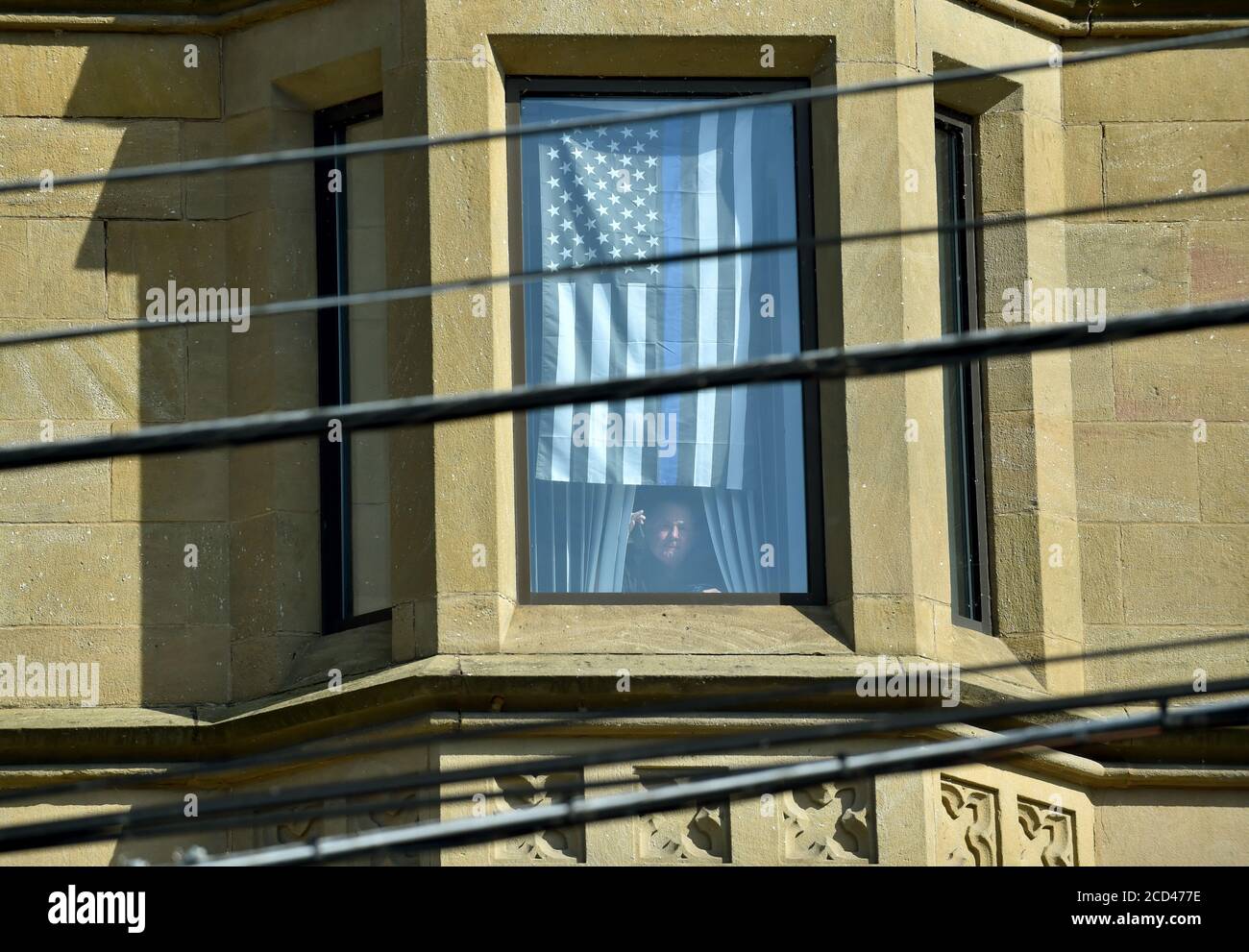 Luzerne County Deputy Prison Warden Sam Hyder looks out on the second ...
