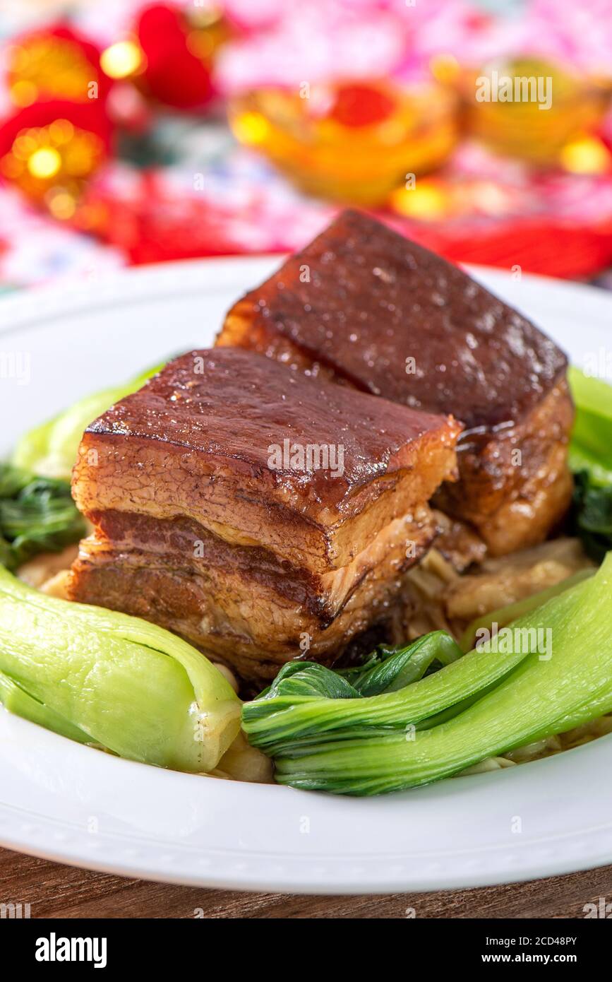 Dong Po Rou (Dongpo pork meat) in a beautiful blue plate with green ...