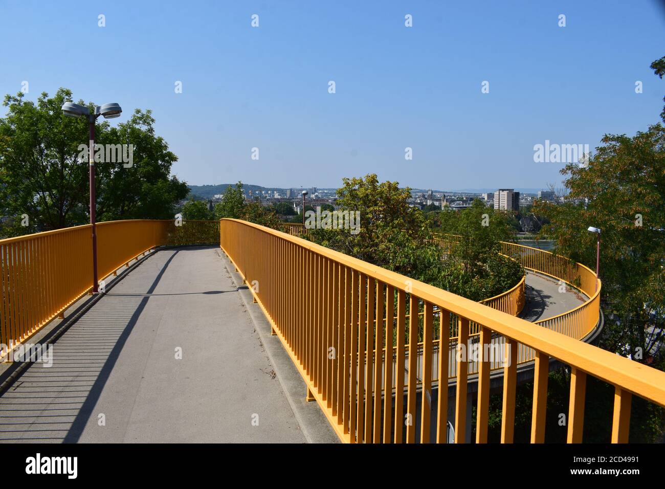 circled bridge to cross a main road Stock Photo - Alamy
