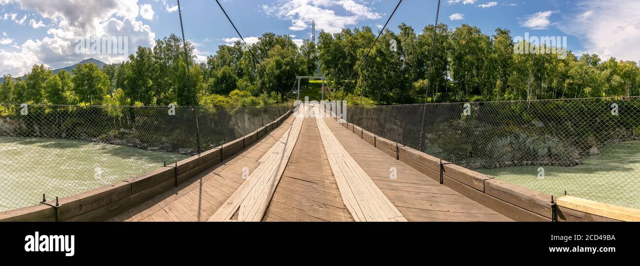 Panoramic shot of a canopy walkway over a river Stock Photo - Alamy