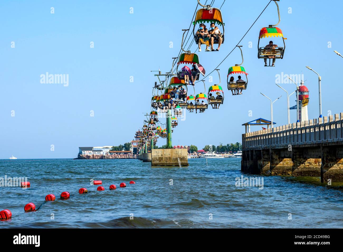 People enjoy the view of Beidai River as people flock to Beidaihe ...