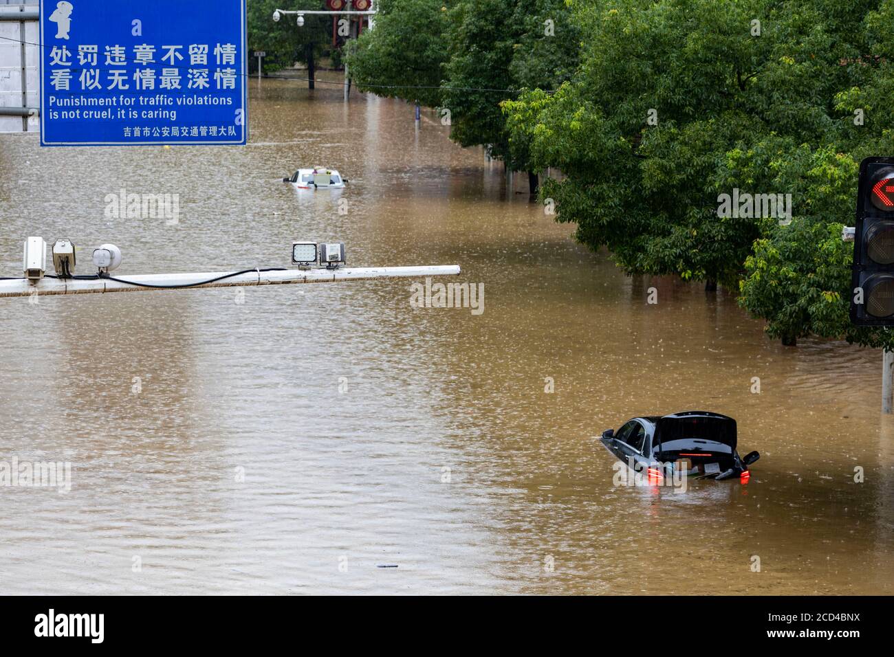 Aerial view of villages and road flooded by heavy rainfall in Xiangxi ...