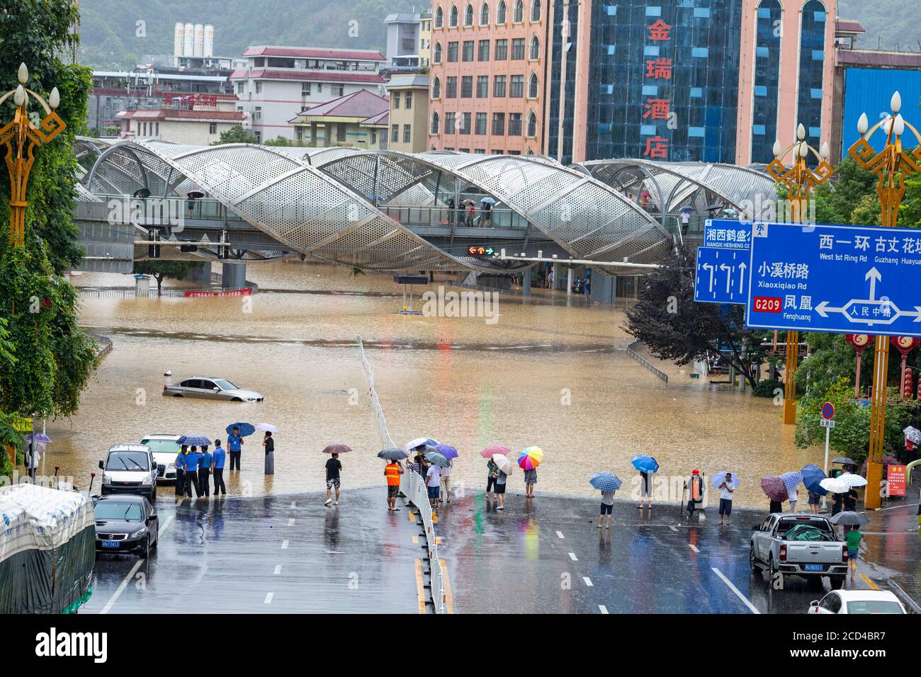 Aerial view of villages and road flooded by heavy rainfall in Xiangxi ...