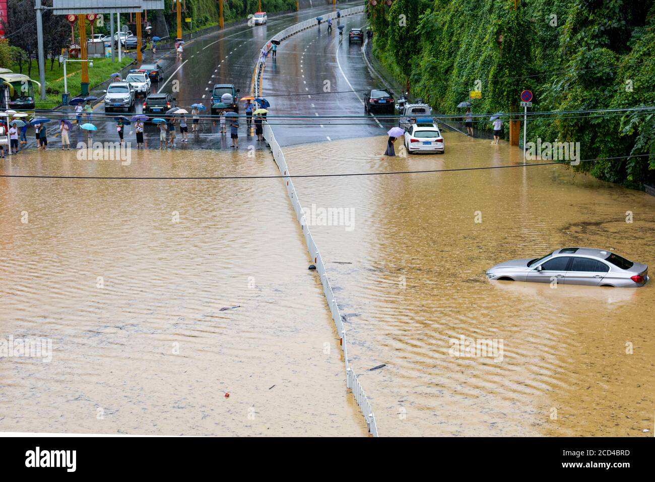 Aerial view of villages and road flooded by heavy rainfall in Xiangxi ...