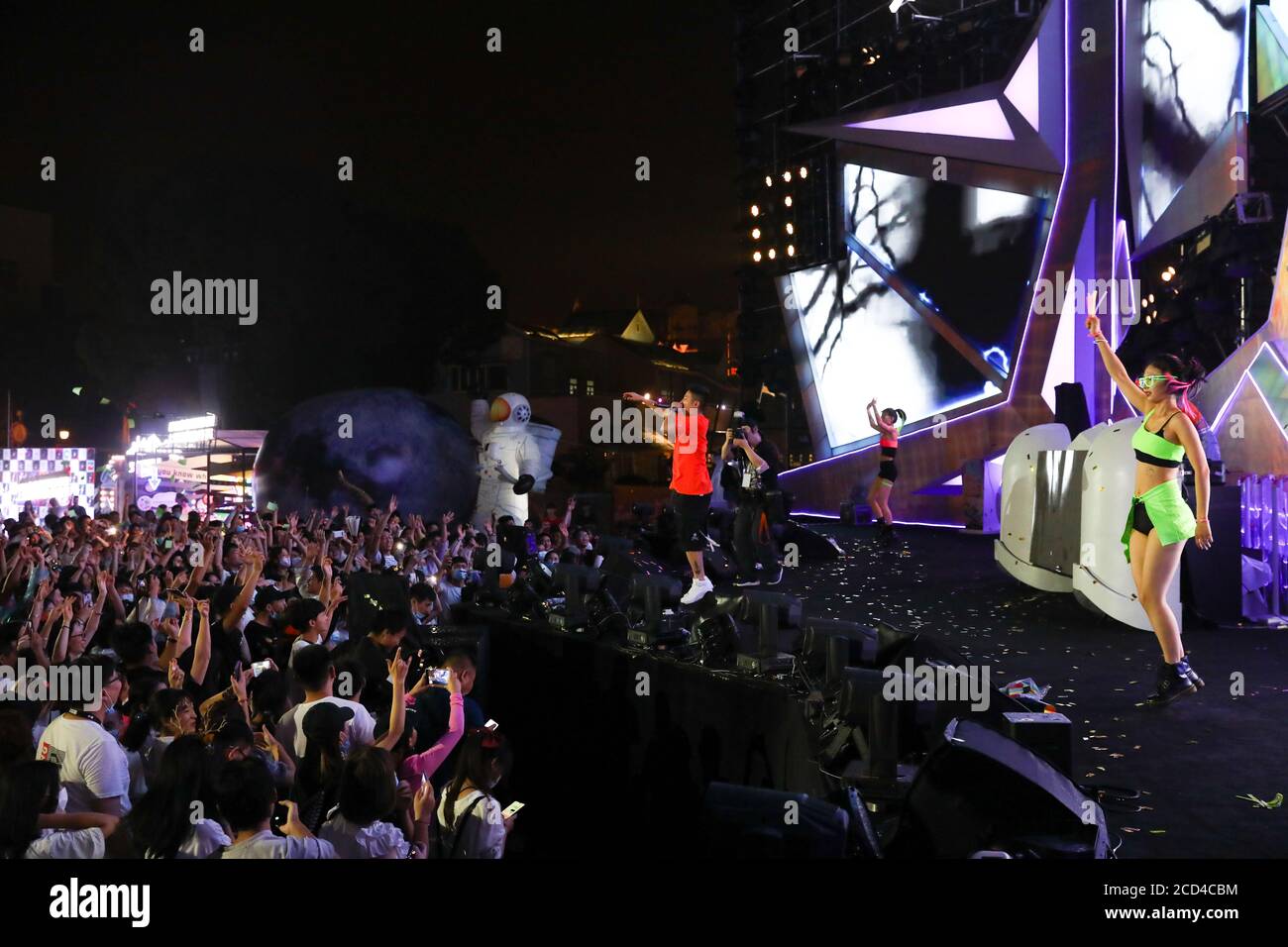 People party at the Electronic Dance Music Festival at the Shanghai ...