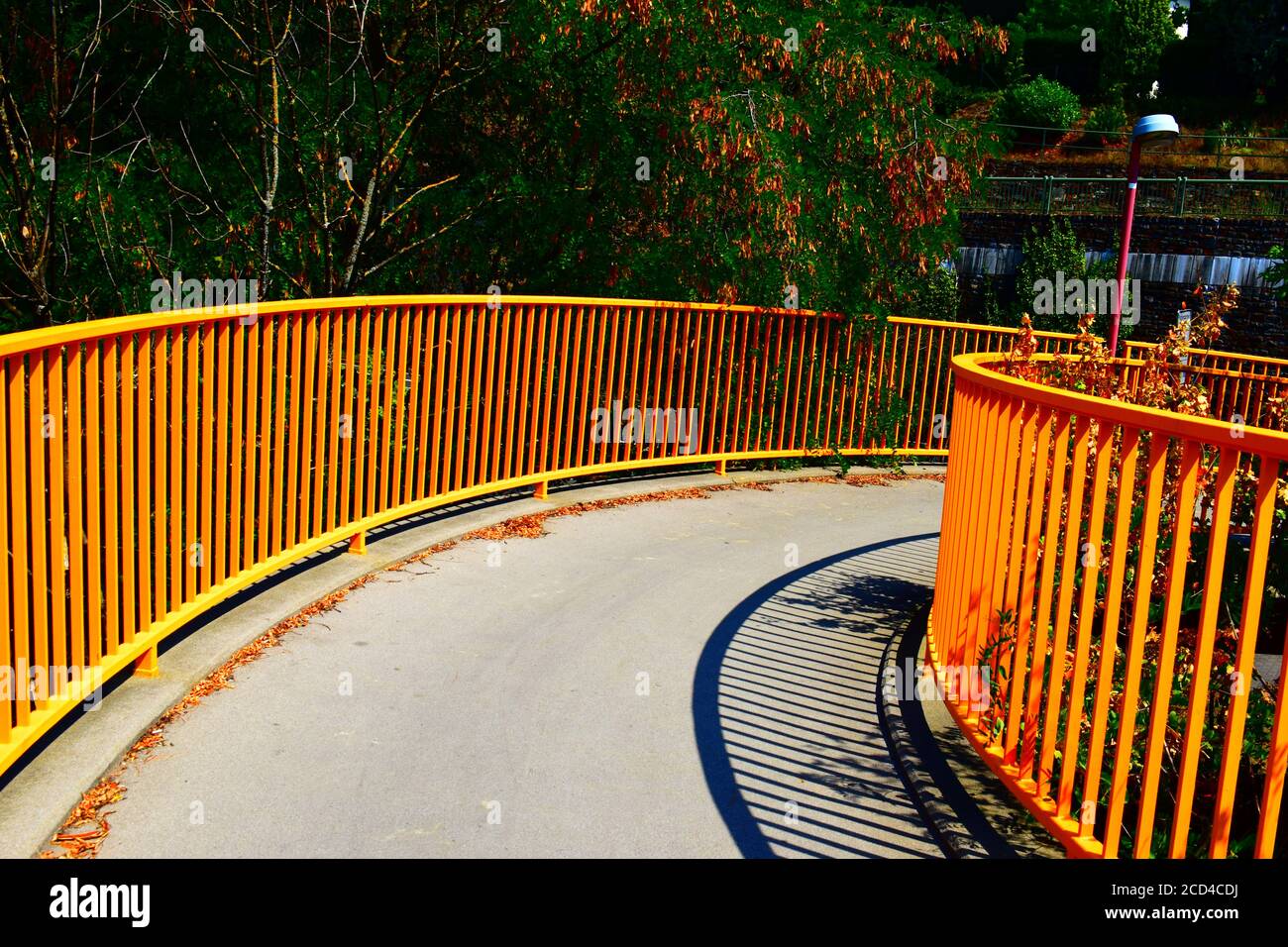 circled bridge to cross a main road Stock Photo - Alamy