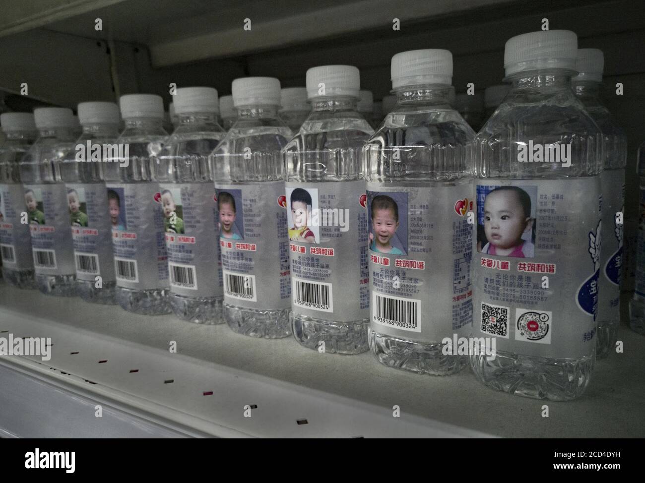 Arrays of bottles of soda water, on the surface of which information ...