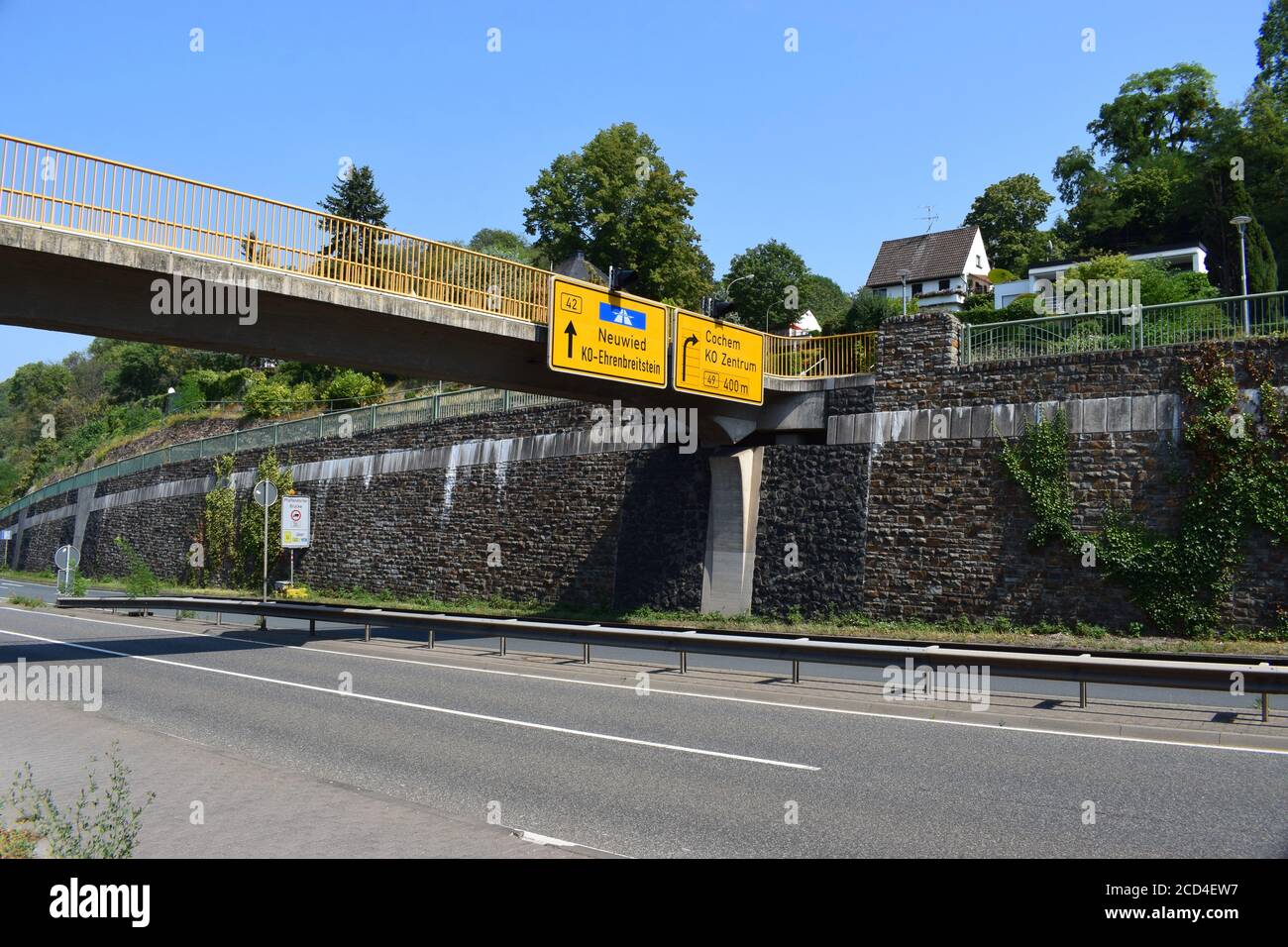 circled bridge to cross a main road Stock Photo - Alamy