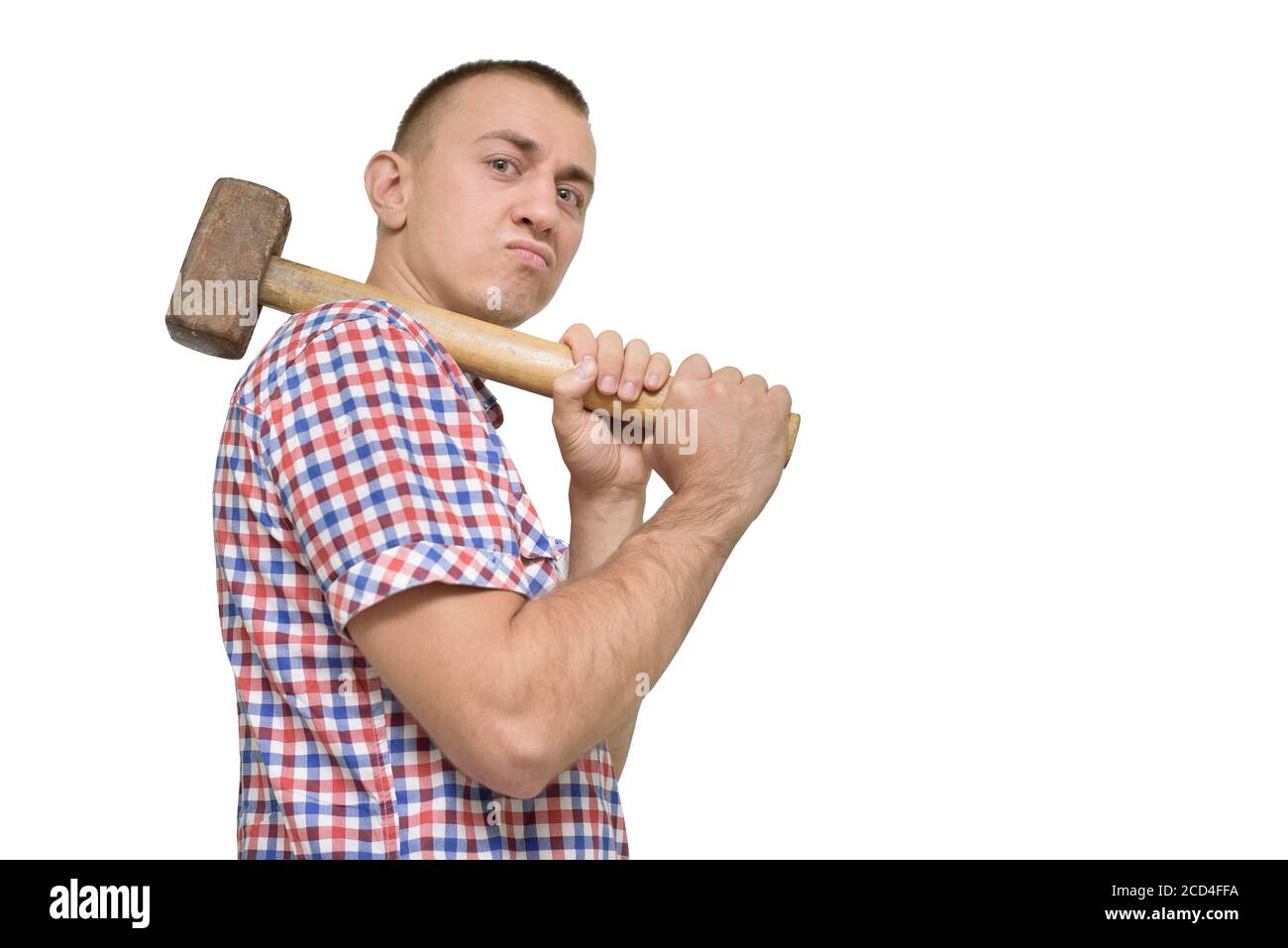 Man with a sledgehammer on a white background. Work concept. Isolate ...