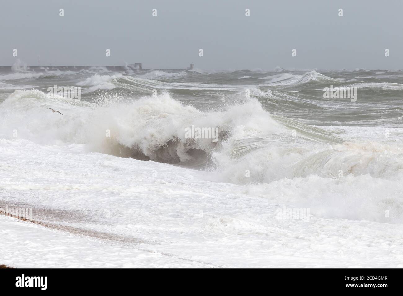 storm breaking on Brighton beach Stock Photo - Alamy