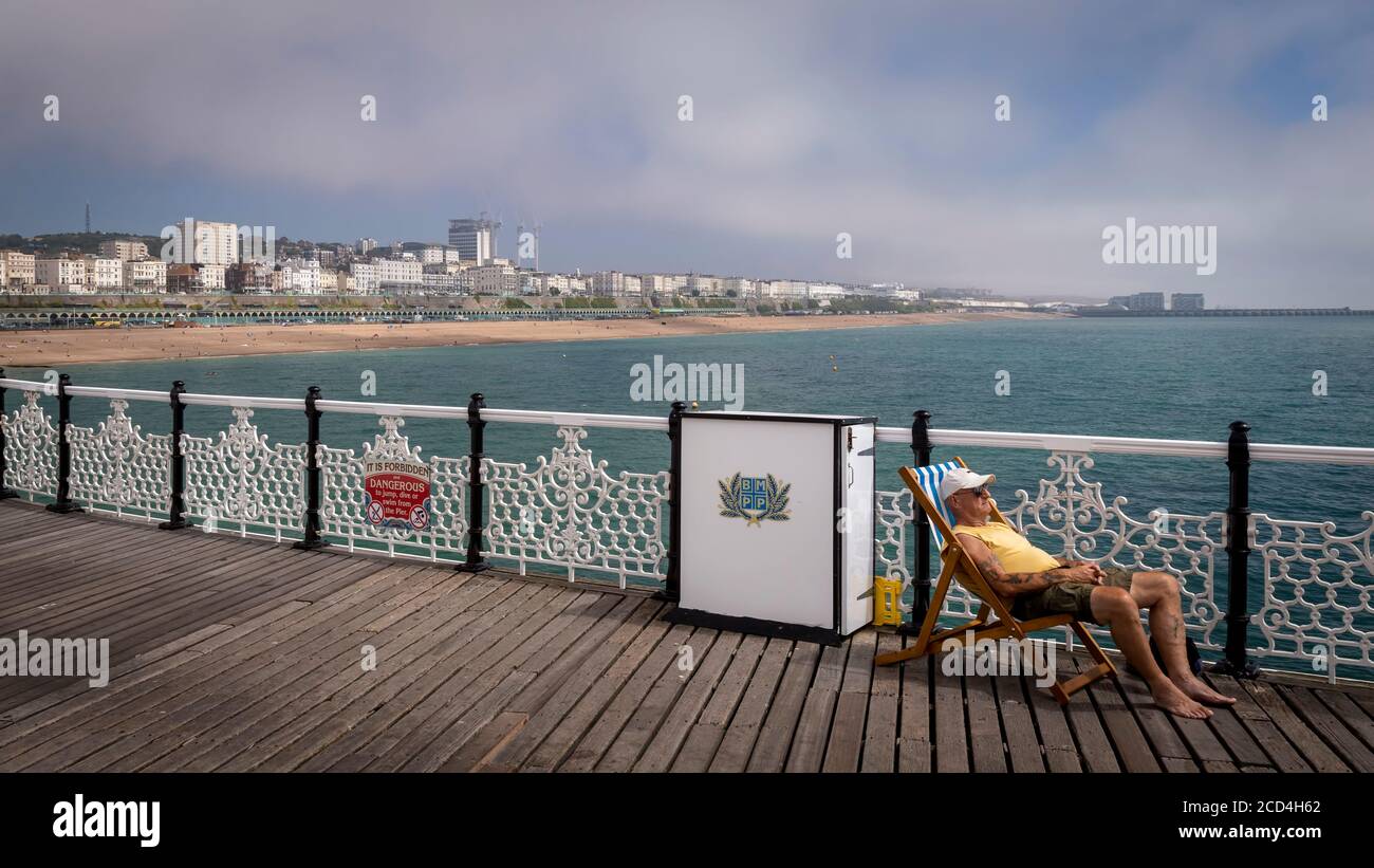 Man Sitting Sprawled High Resolution Stock Photography and Images - Alamy