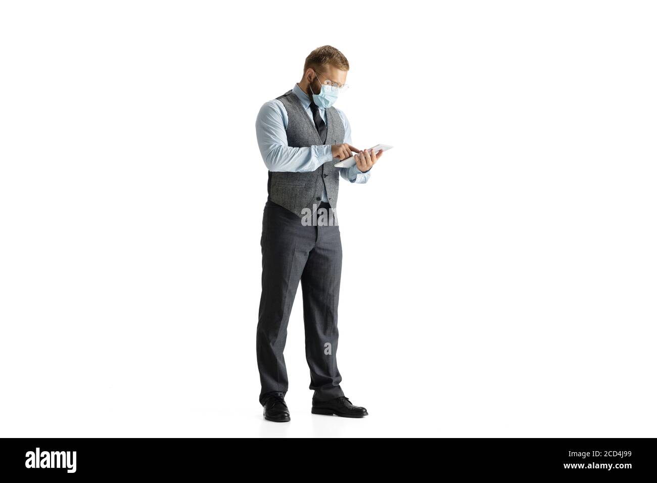 Cheerful handsome businessman isolated over white studio background ...