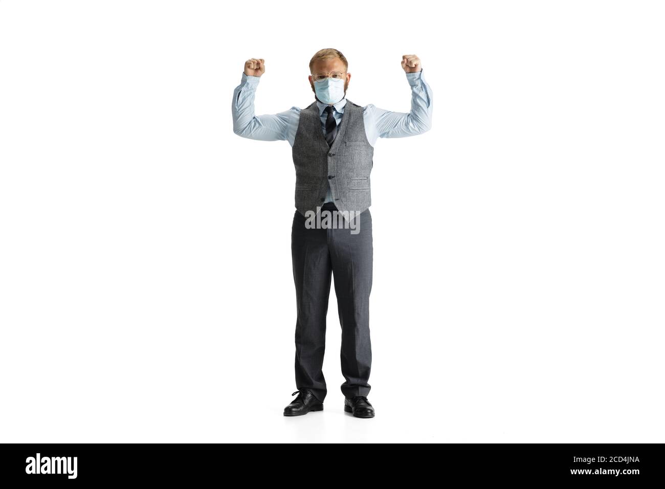 Cheerful handsome businessman isolated over white studio background ...