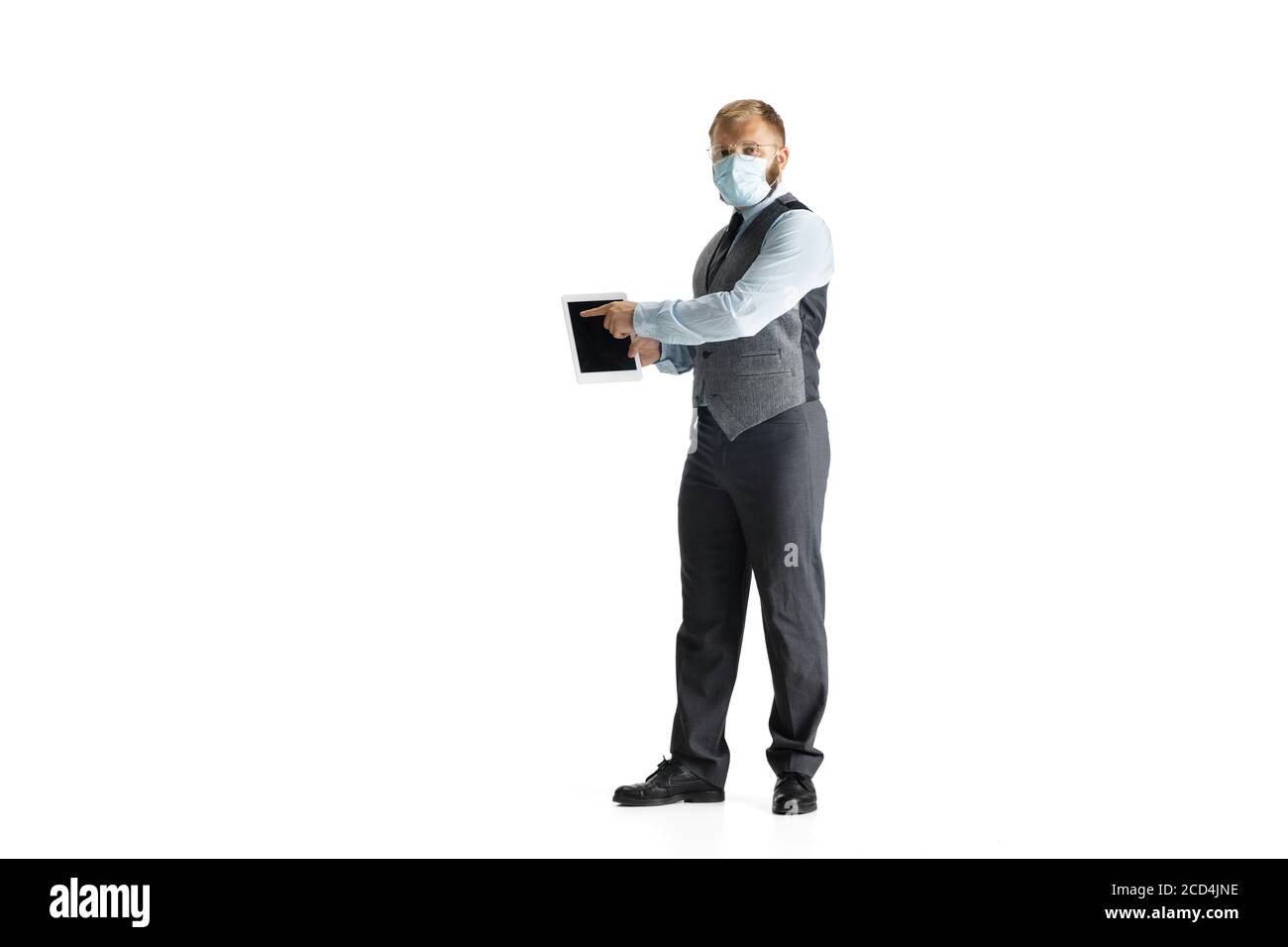 Cheerful handsome businessman isolated over white studio background ...