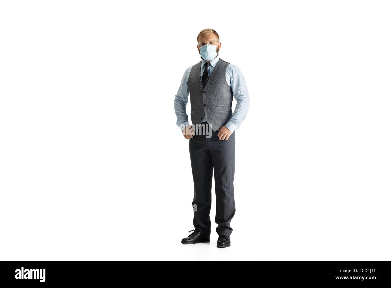 Cheerful handsome businessman isolated over white studio background ...