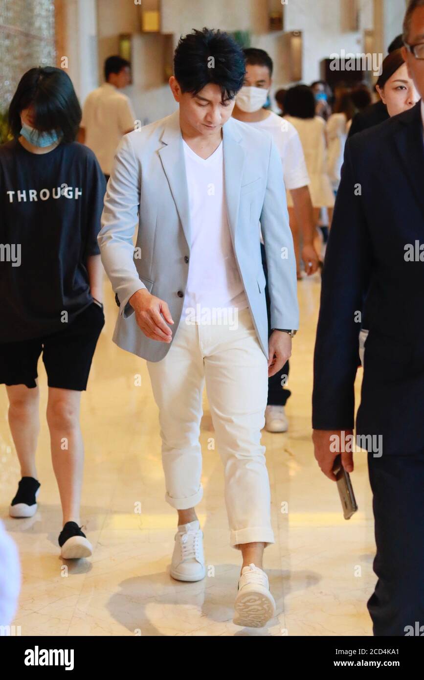 Taiwanese singer and actor Nicholas Wu Qilong arrives in a hotel, he is ...