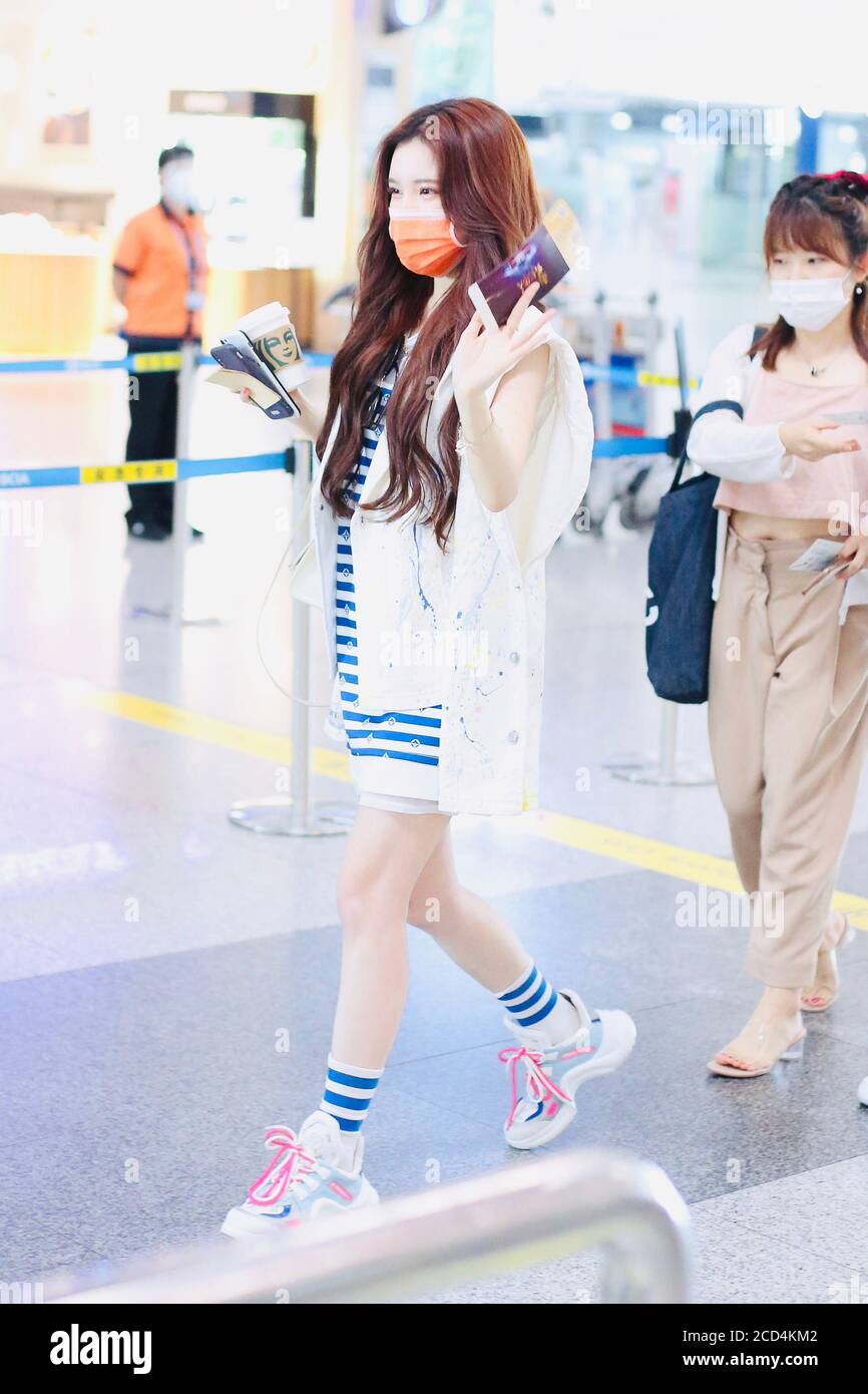 Chinese actress and singer Dai Yanni arrives at a Beijing airport ...