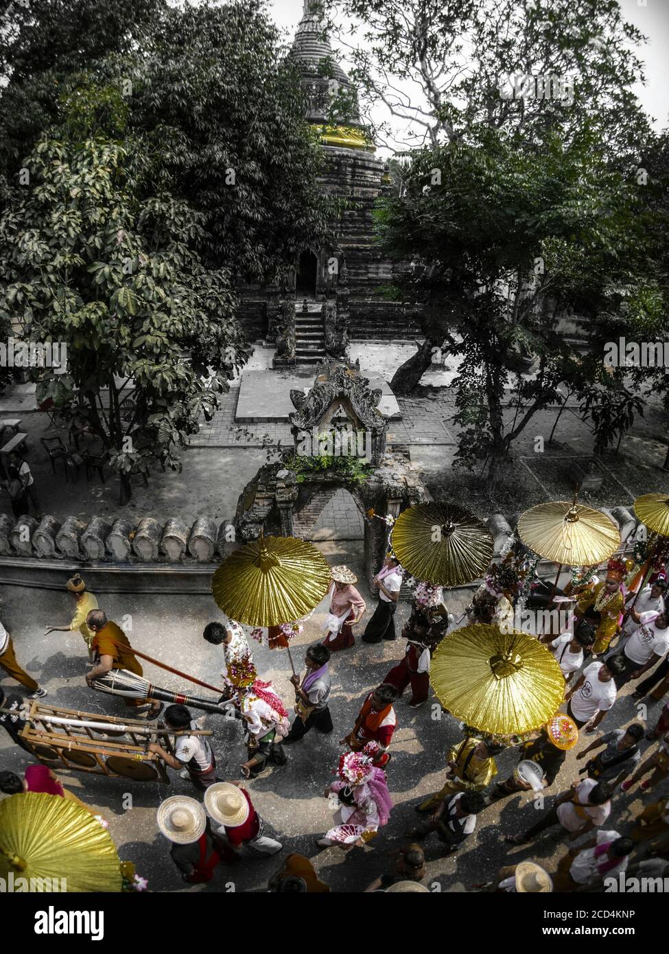 Making merit at a Buddhist temple in Northern Thailand Stock Photo - Alamy