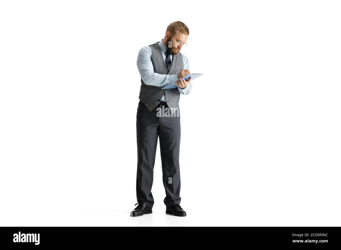 Cheerful handsome businessman isolated over white studio background ...