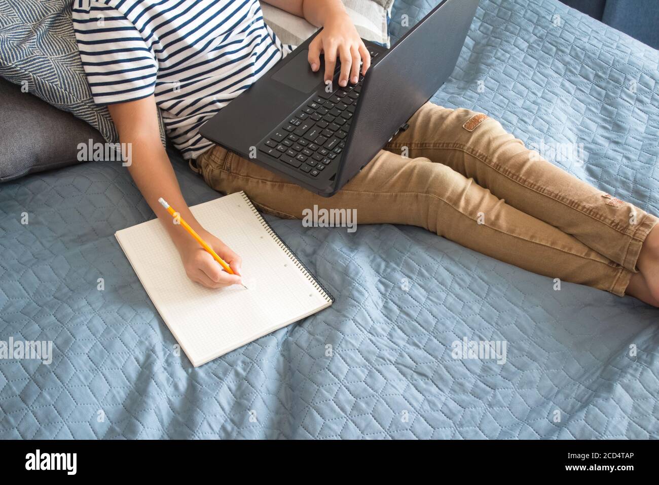 Back view boy student drawing hi-res stock photography and images - Alamy