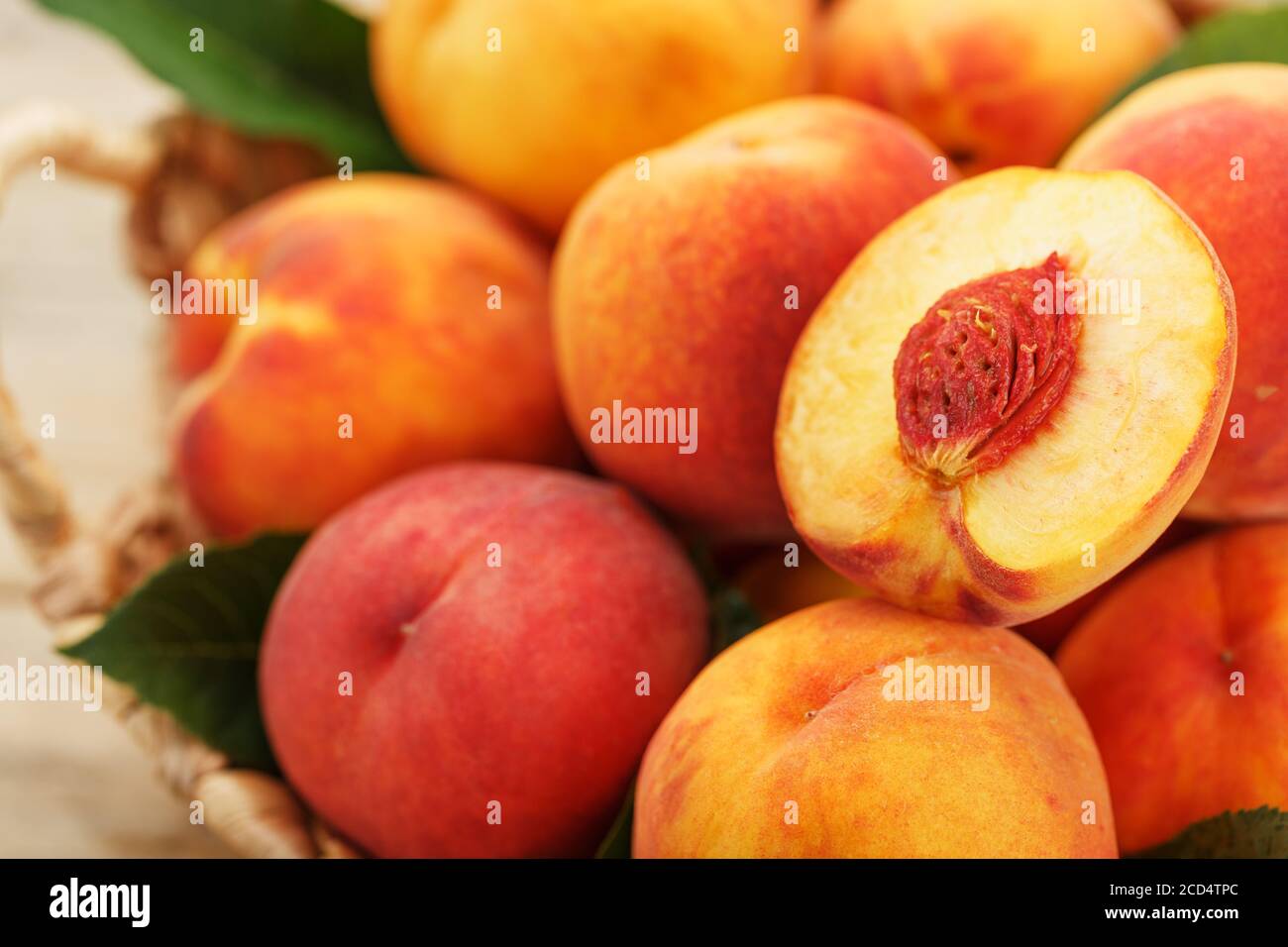 A slice of juicy and ripe peach with a close-up stone. Cut fruit Stock ...