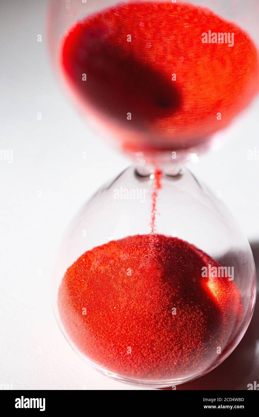 Red hourglass hi-res stock photography and images - Alamy