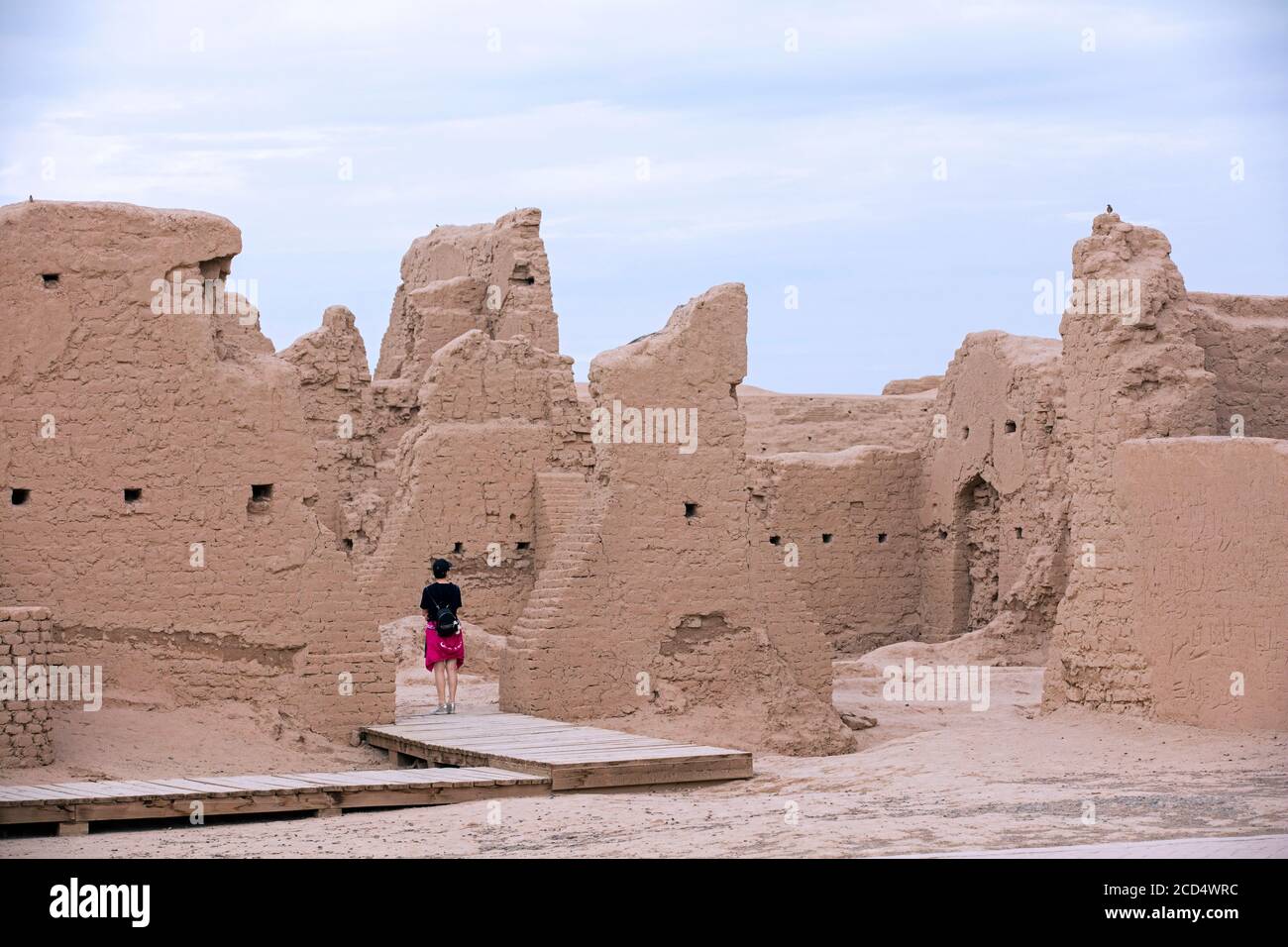 Tourist visiting Jiaohe / Yarkhoto, ruined city in the Yarnaz Valley ...