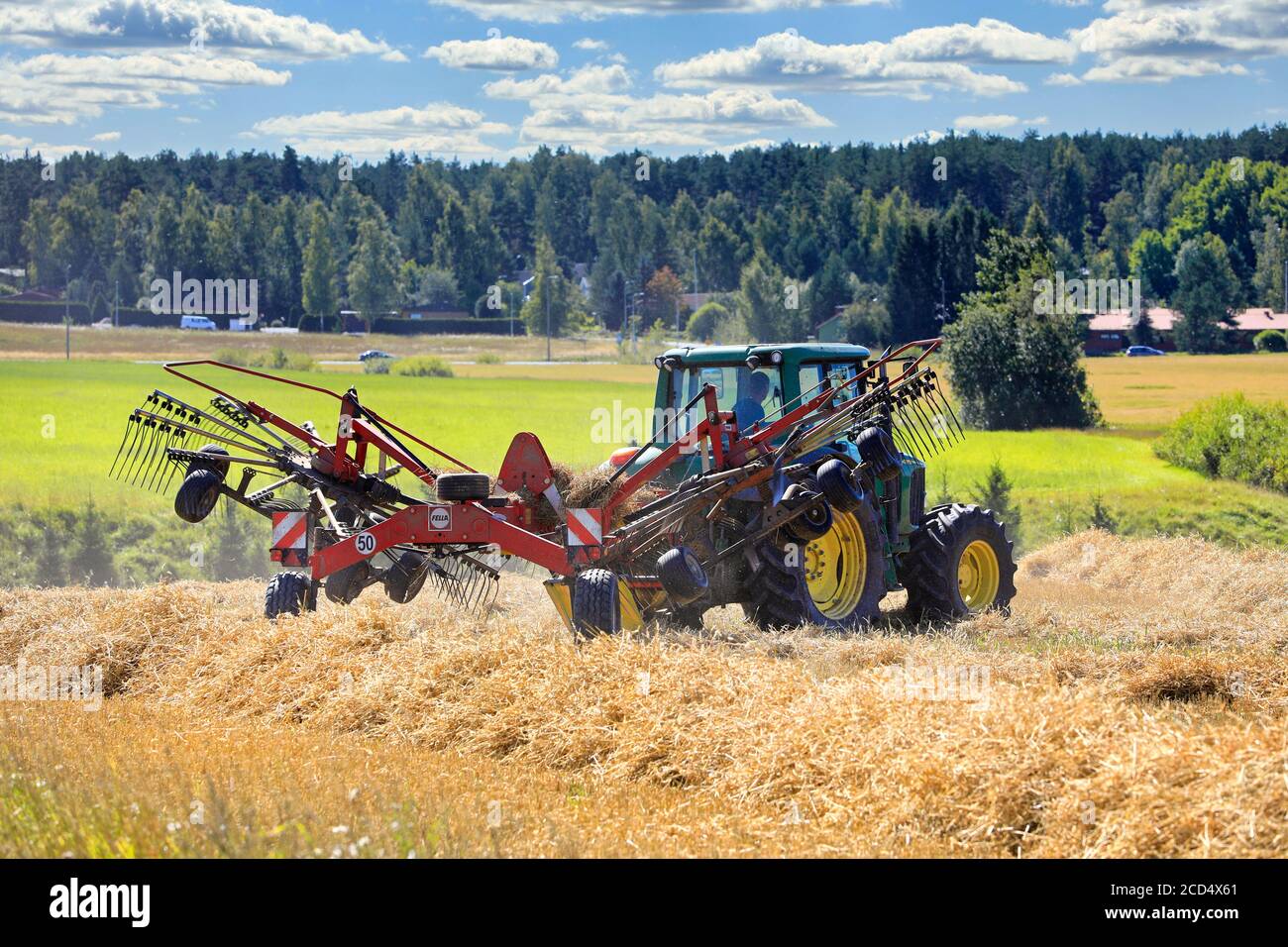 Farmer with rake on field hi-res stock photography and images - Alamy