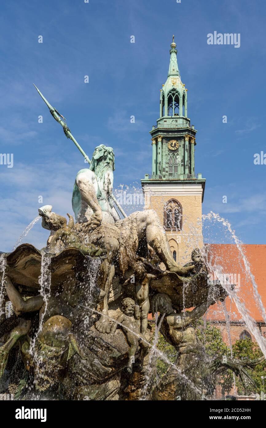 Neptune Fountains, known as Neptunbrunnen in German, and the tower of ...