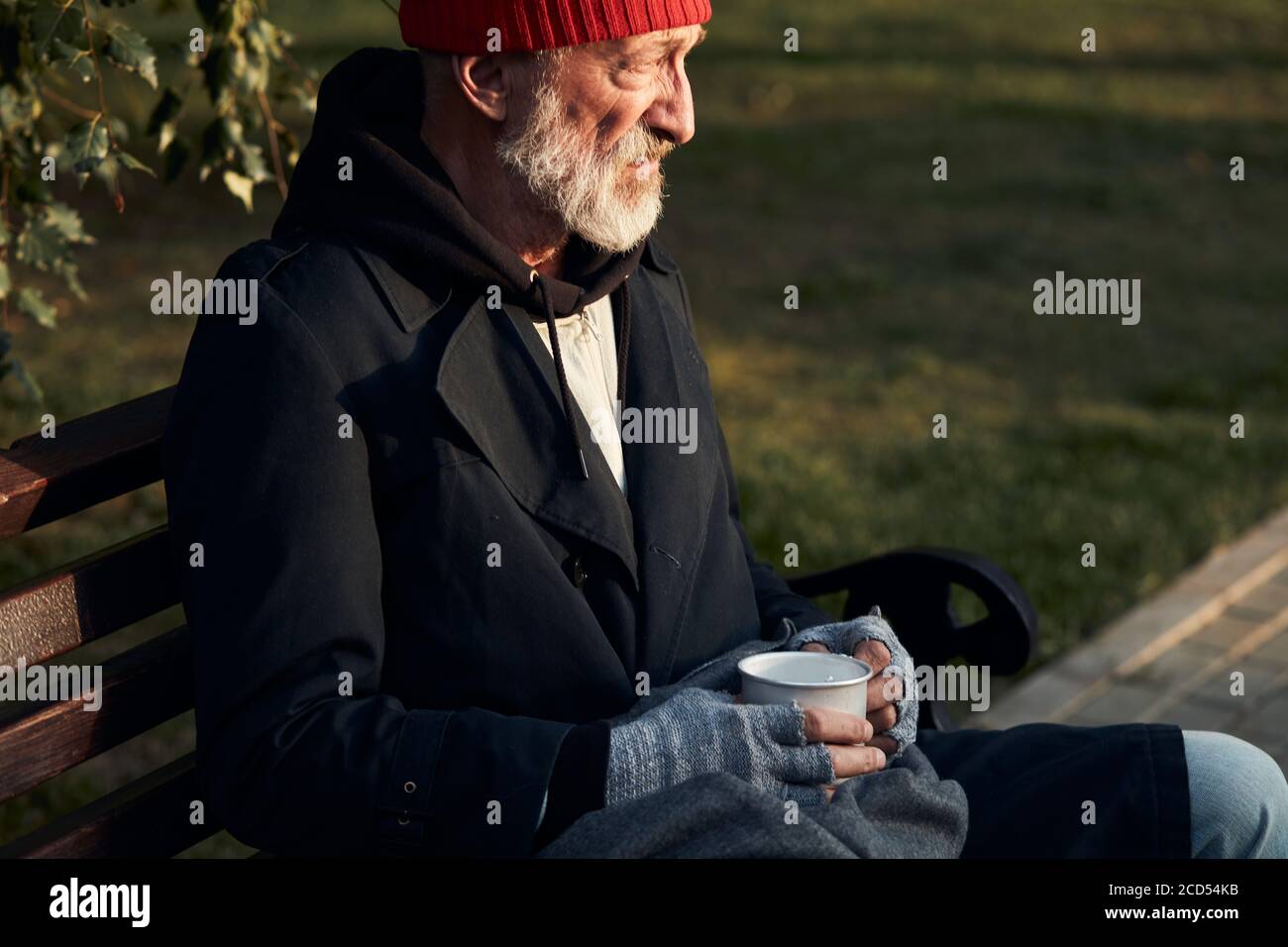 Side view on senior bum male desperately looking at empty street ...