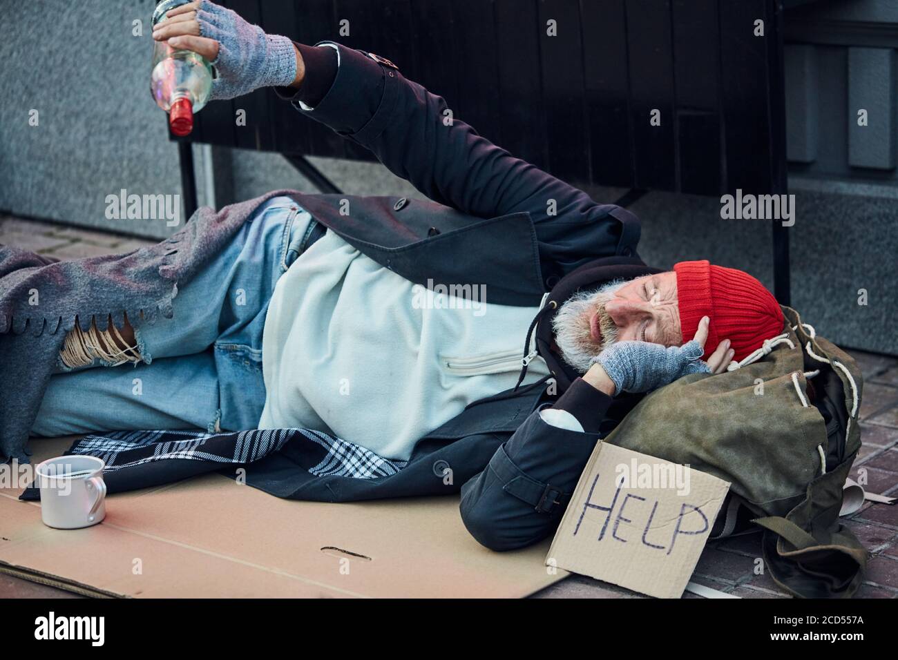 Old person sad in grey weather hi-res stock photography and images - Alamy