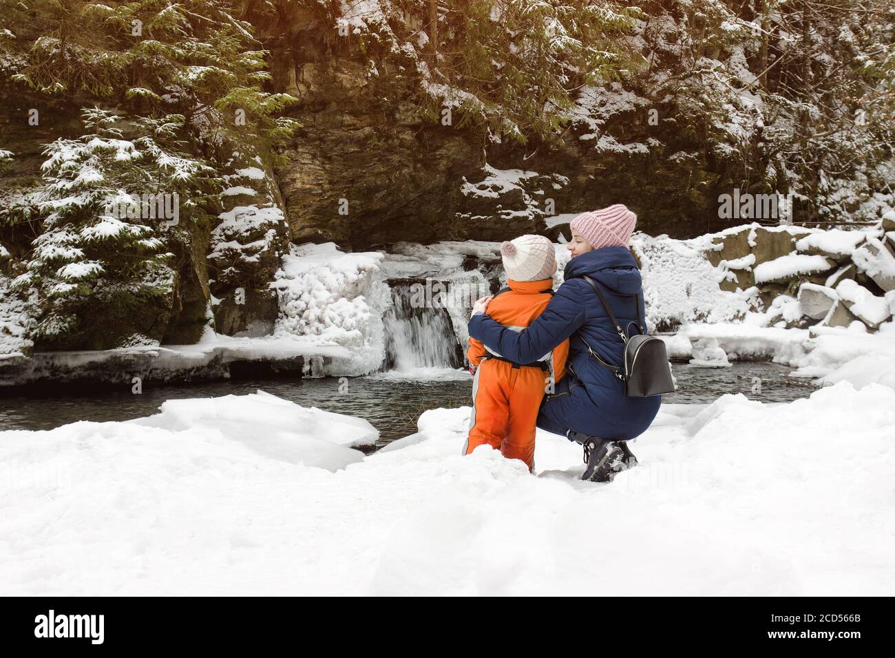 Boy sitting by a waterfall hi-res stock photography and images - Alamy