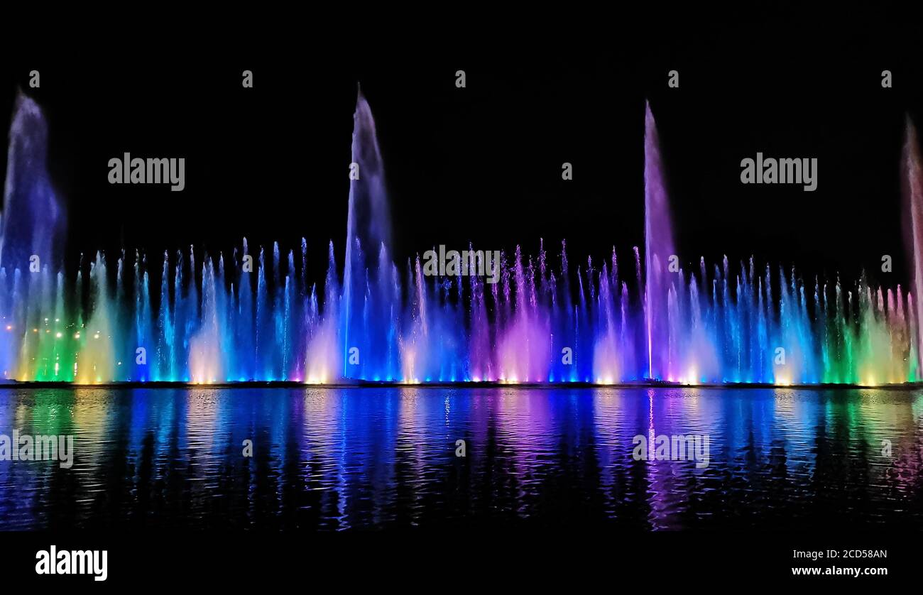 Night laser fountain show, on the Roshen embankment, the Ukrainian city ...