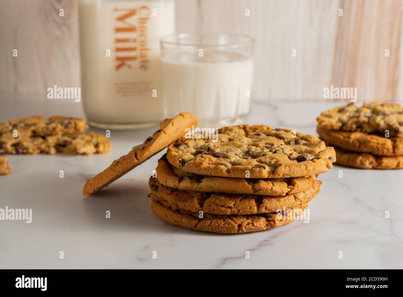 cookie leaning stack milk background Stock Photo - Alamy