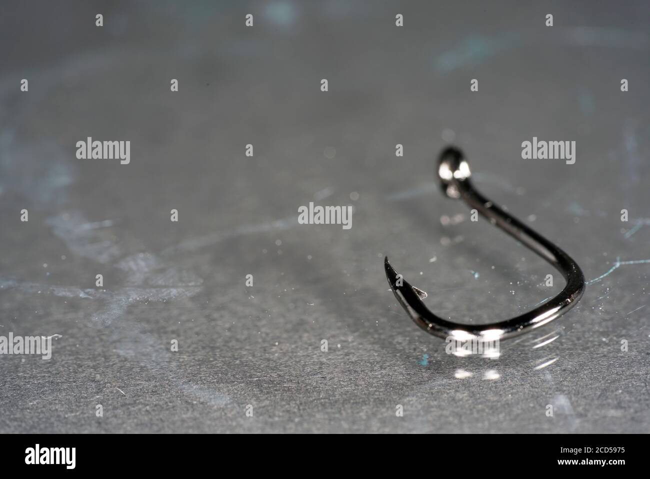 Closeup shot of metal fishing hook Stock Photo - Alamy