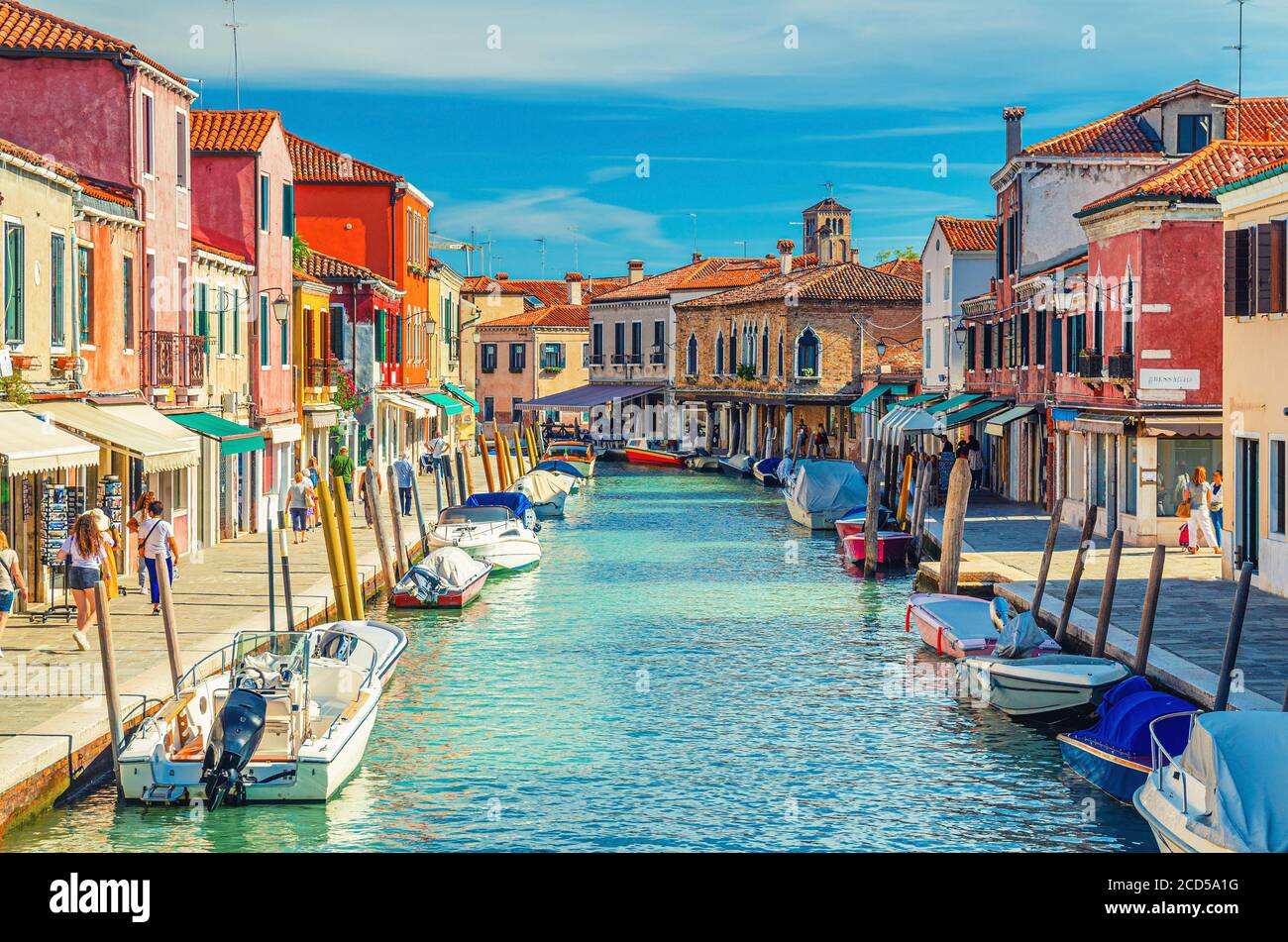 Murano islands with water canal, boats and motor boats, colorful ...