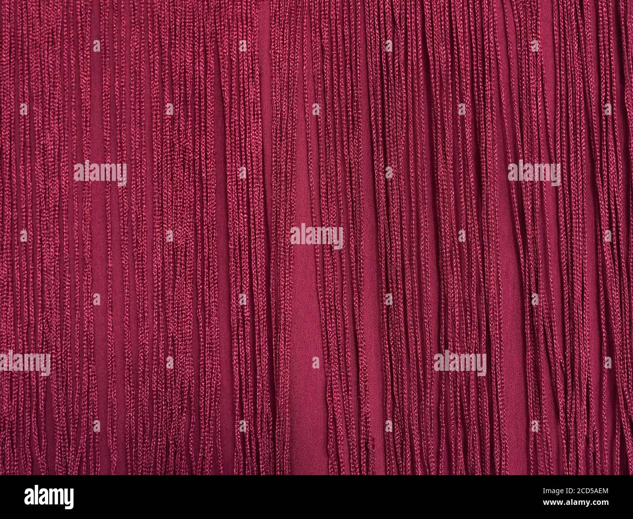 Maroon fabric with fringe. Close-up. Background Stock Photo - Alamy