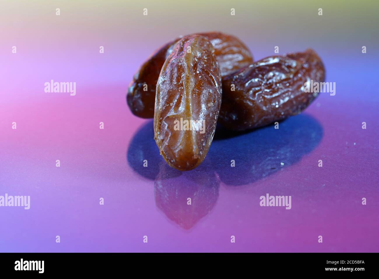 Closeup of date palm seeds Stock Photo - Alamy