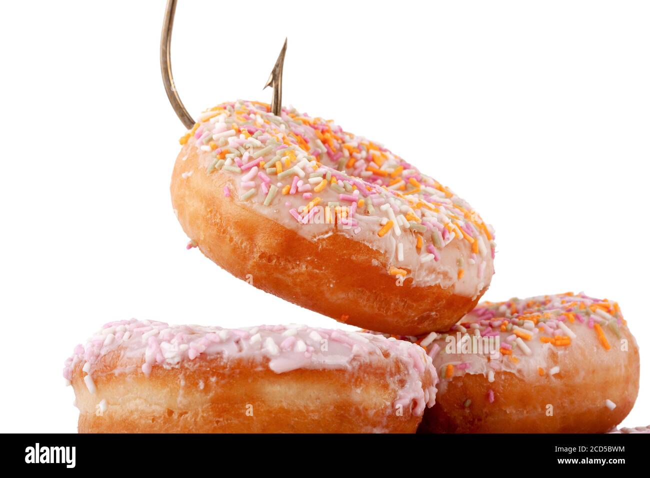 Donut cake caught with a hook hi-res stock photography and images - Alamy