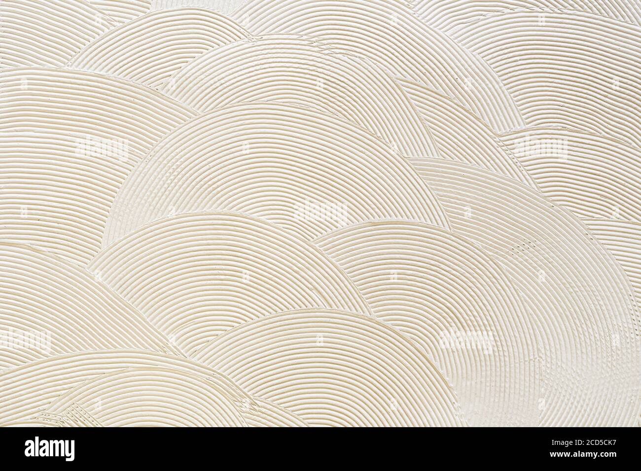 Circular patterns on white plaster. Abstract texture Stock Photo - Alamy
