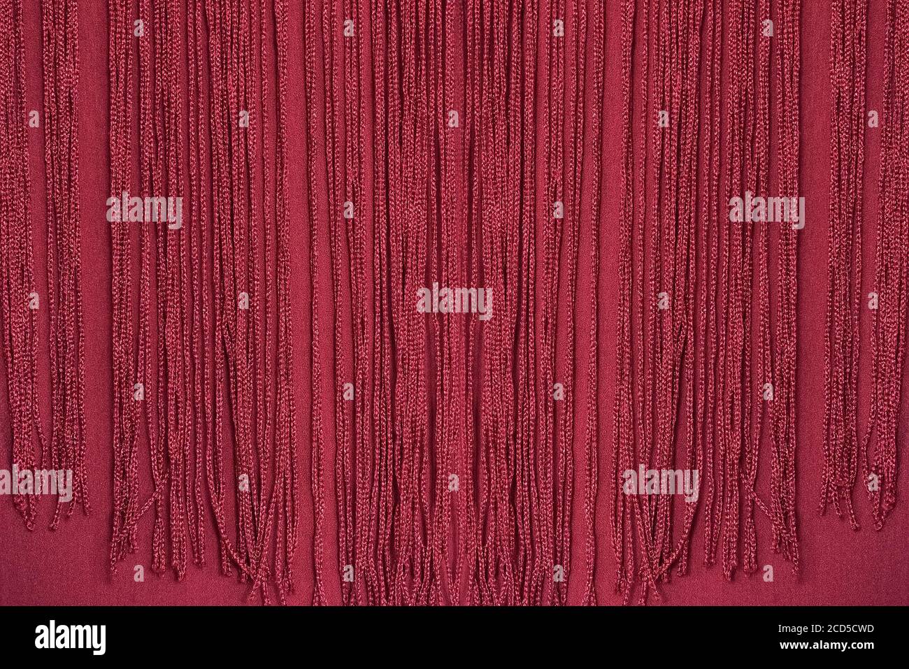 Maroon fabric with fringe. Close-up. Background Stock Photo - Alamy