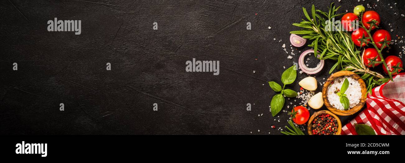 Food cooking background at black top view Stock Photo - Alamy