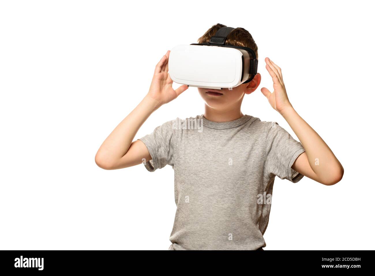 Boy experiencing virtual reality. Portrait. Isolate on white background ...