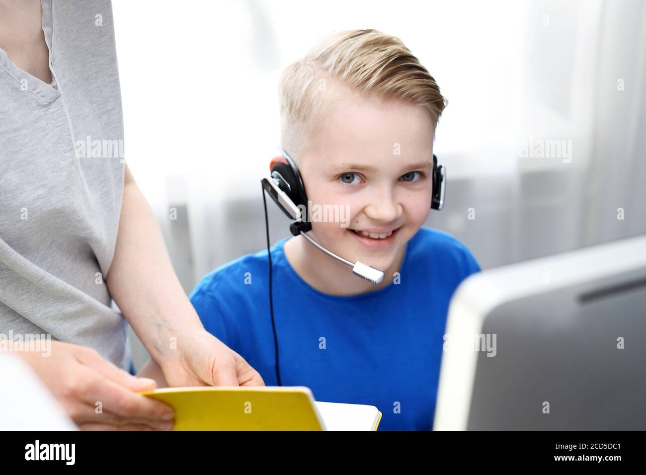 Online lesson.E-learning. School on the web. The child learns via the ...