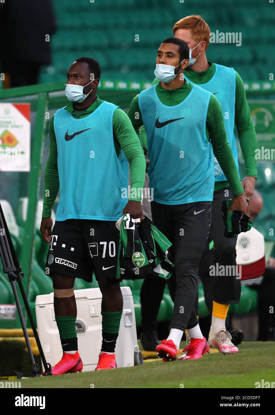 Ferencvaros substitutes wearing PPE maps during the UEFA Champions ...